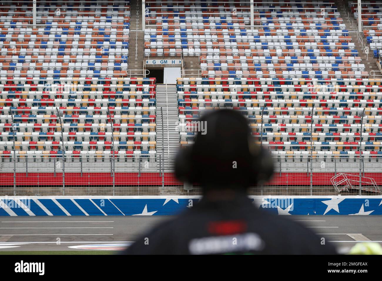 An empty grandstand faces the track at a NASCAR Xfinity Series auto ...