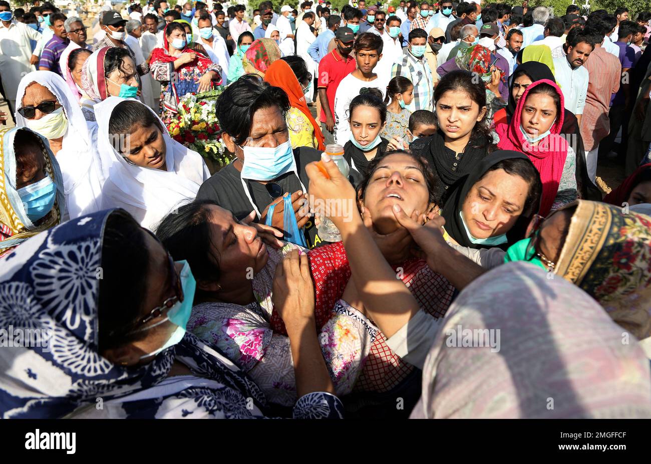 Family members and relatives of Simon Eric who died in the plane crash ...