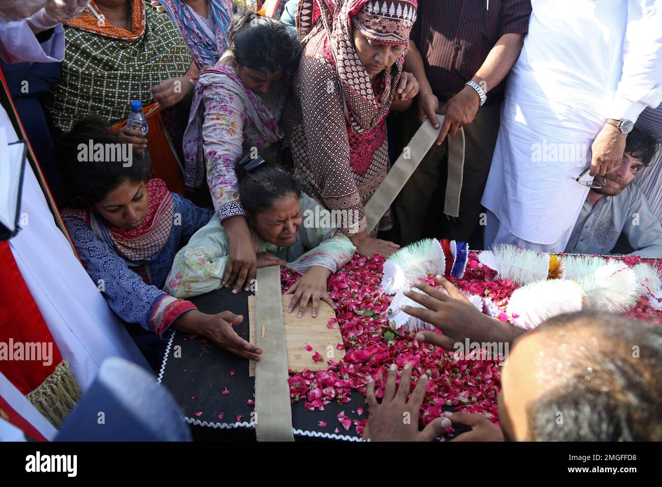 Family members and relatives of Simon Eric who died in the plane crash ...