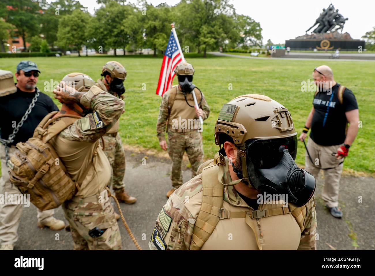 A group of veterans with Operation Enduring Warrior stop in front of ...