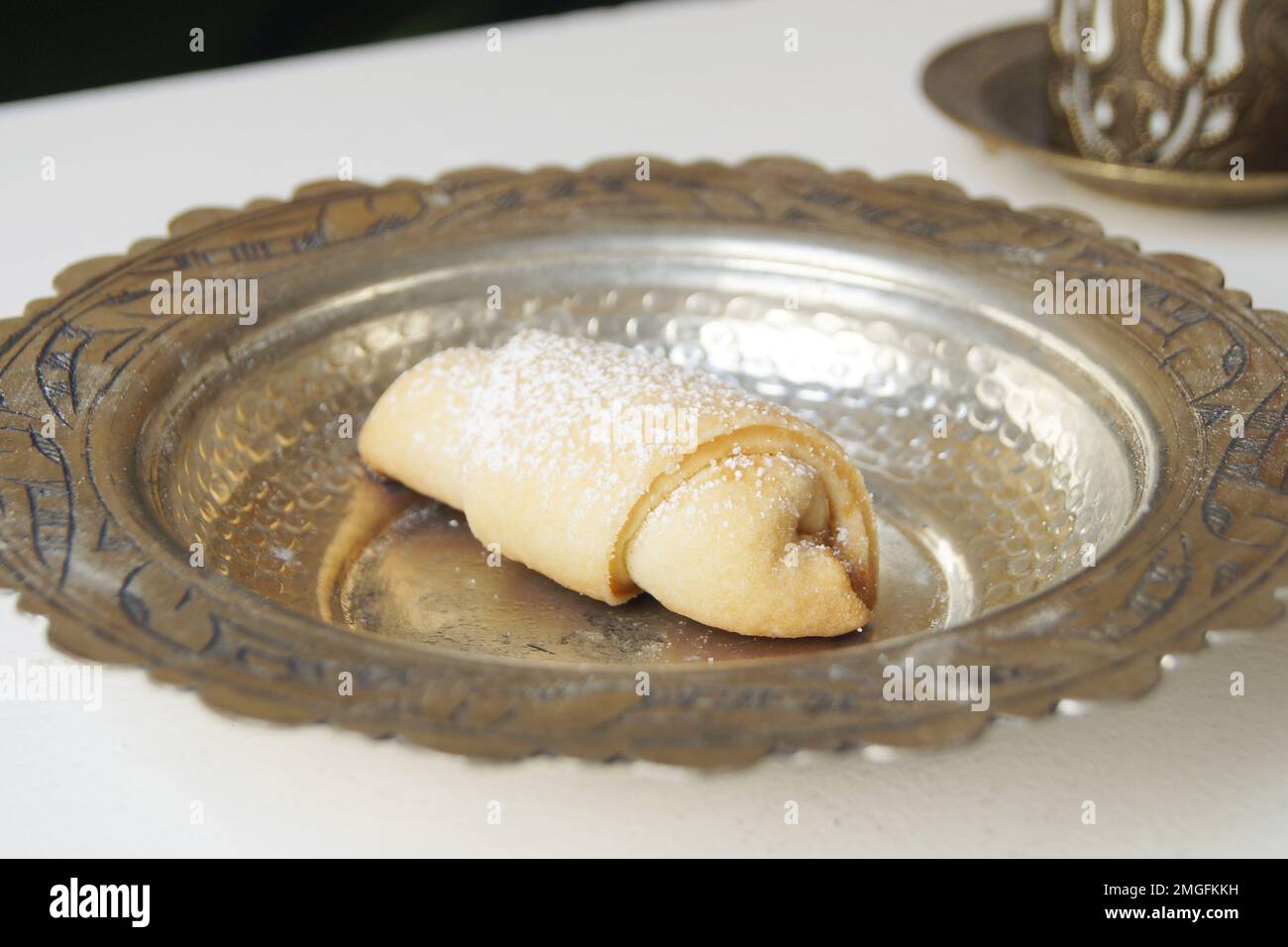 Ghraybeh are super thin shortbread cookies made with ghee, icing sugar ...
