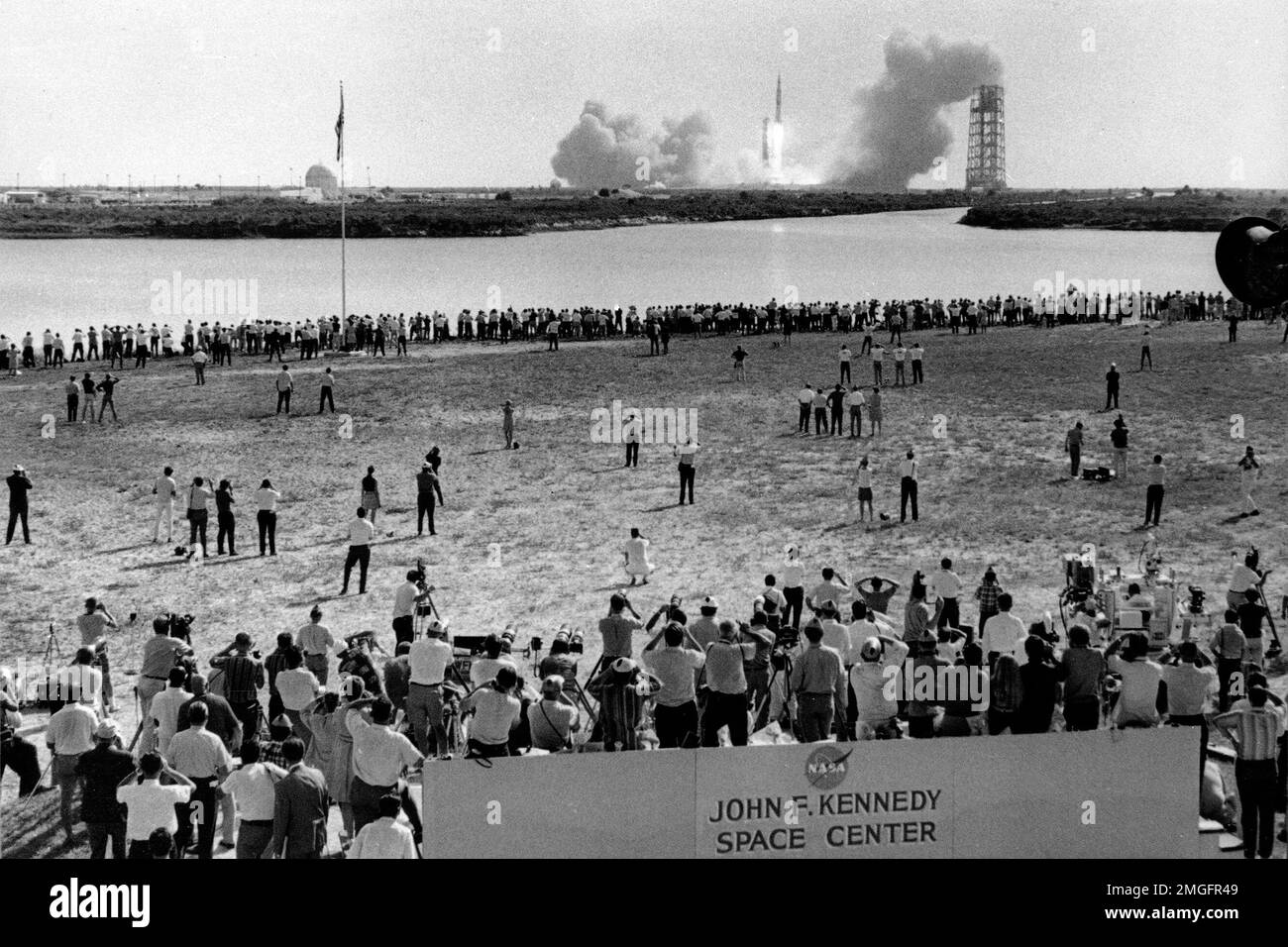 FILE - In this July 16, 1969 file photo, reporters line the banks of a ...