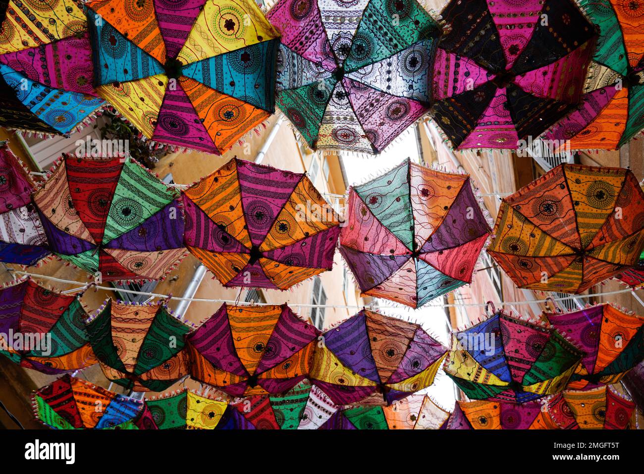 Multiple colors umbrellas hanging city street in summer town Stock ...