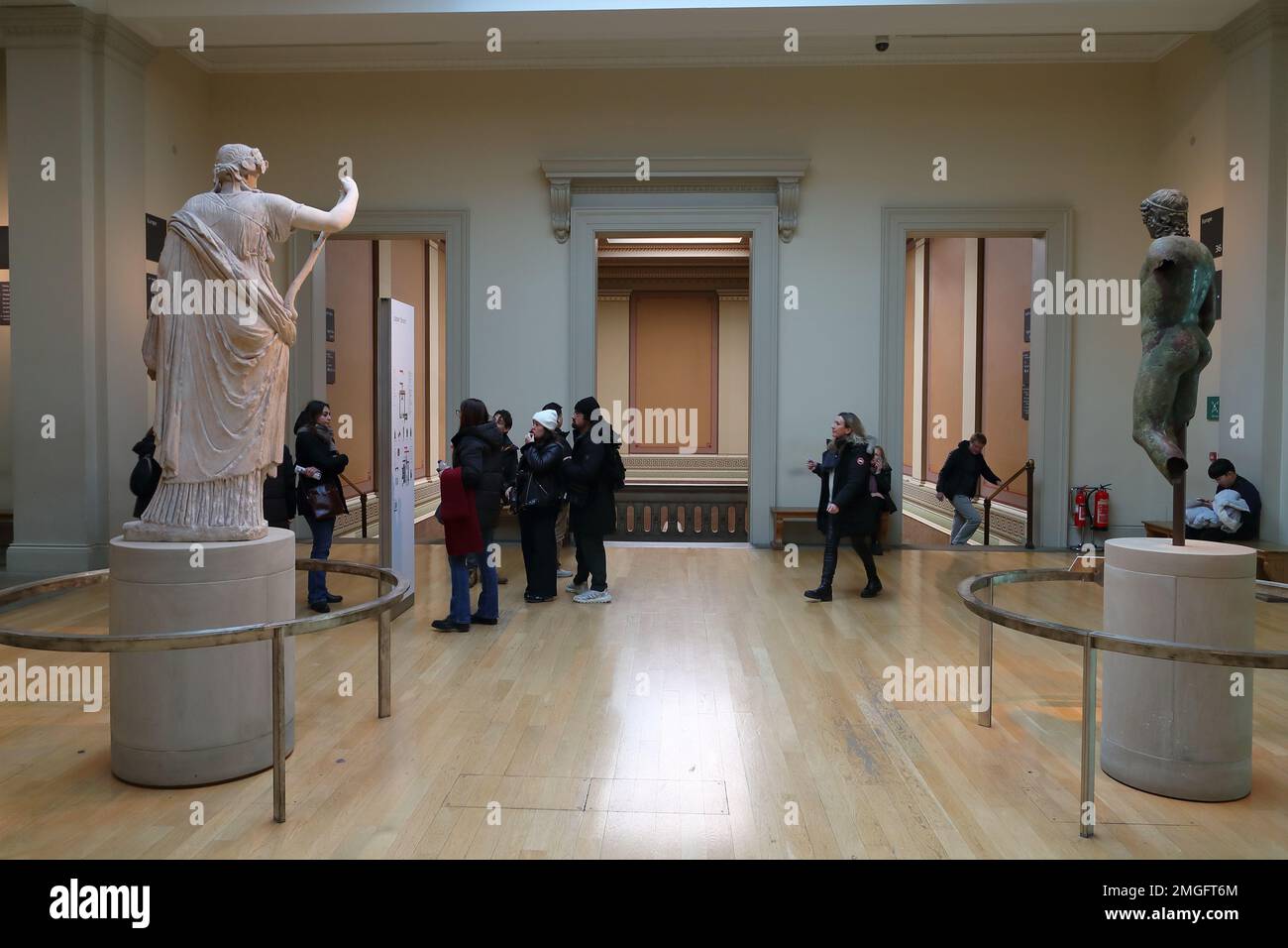 Visitors study Roman statues at the British Museum in London, UK Stock ...
