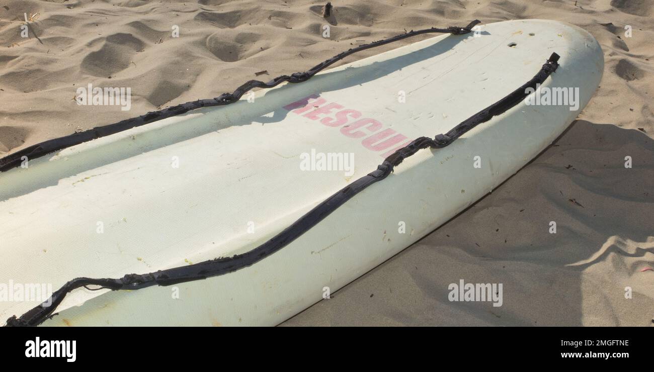 a white surf rescue for guard on sand beach Stock Photo - Alamy