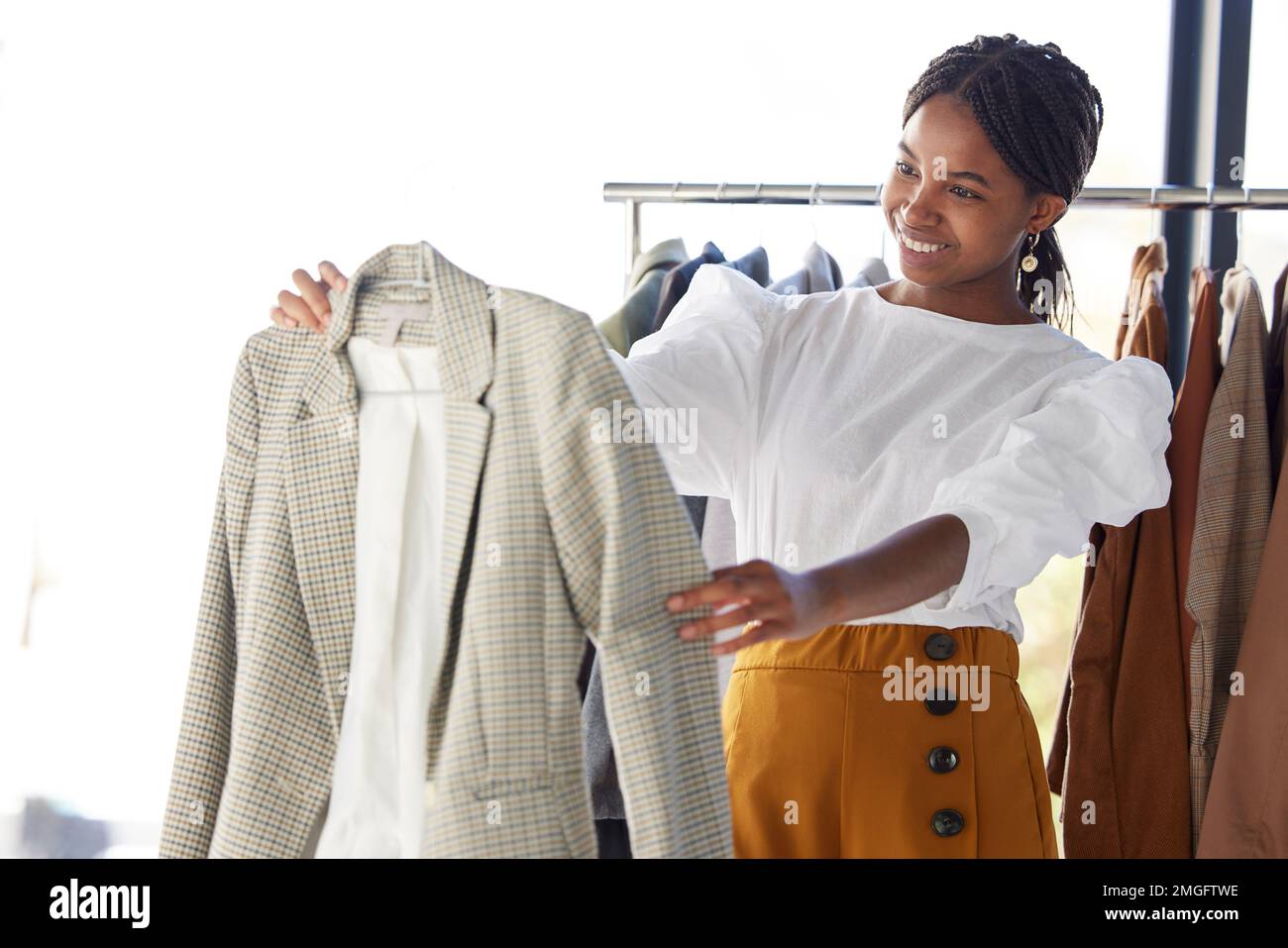 Shopping, retail and black woman with fashion choice, wardrobe ...