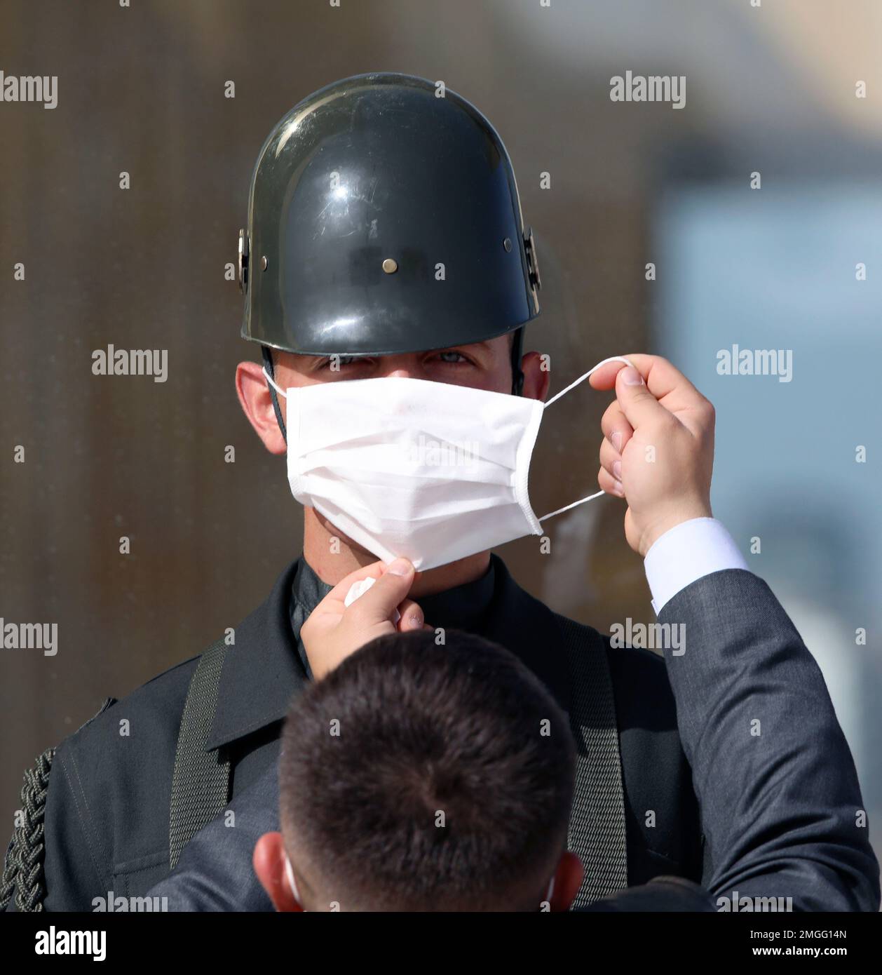 A Turkish soldier wearing a face mask for protection against the new ...