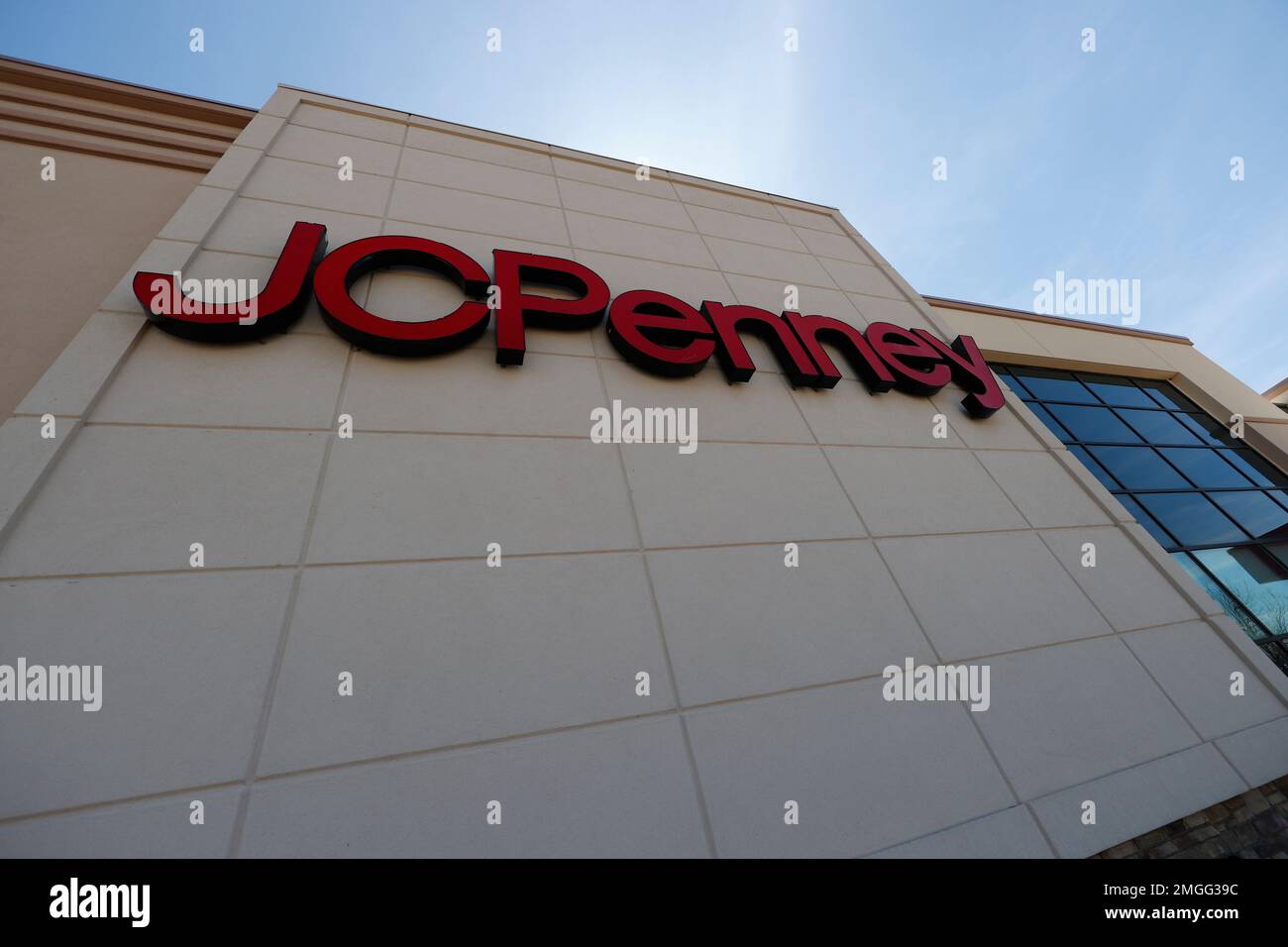 The company sign hangs over the shuttered entrance to a JCPenney ...