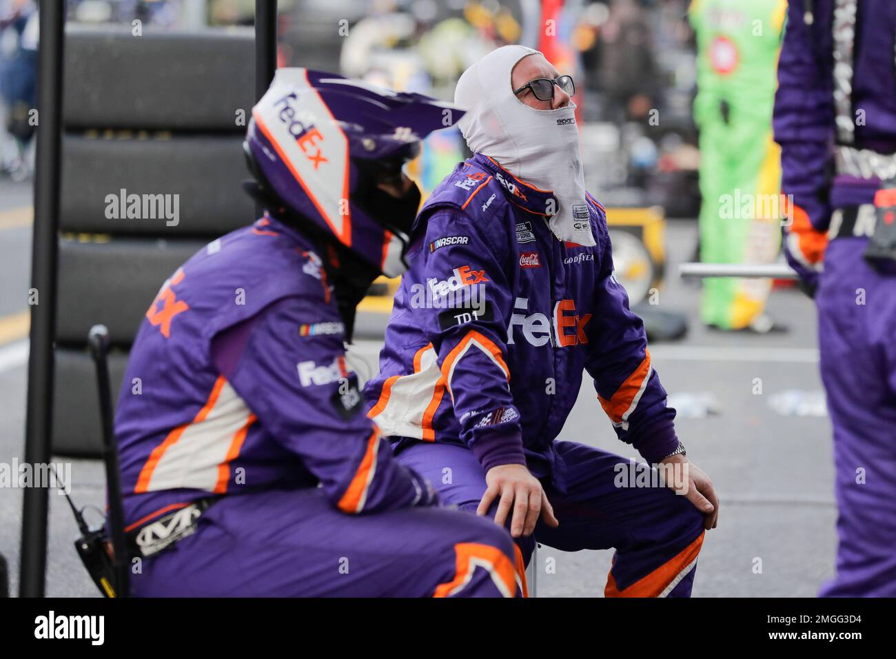 Pit crews members for driver Denny Hamlin watch during the NASCAR Cup Series auto race Sunday ...