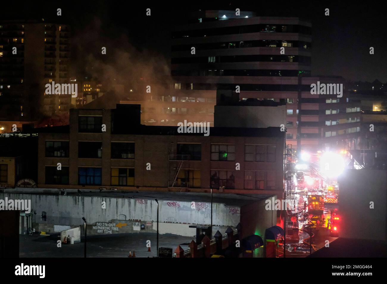 Los Angeles Fire Department firefighters work the scene of a structure ...