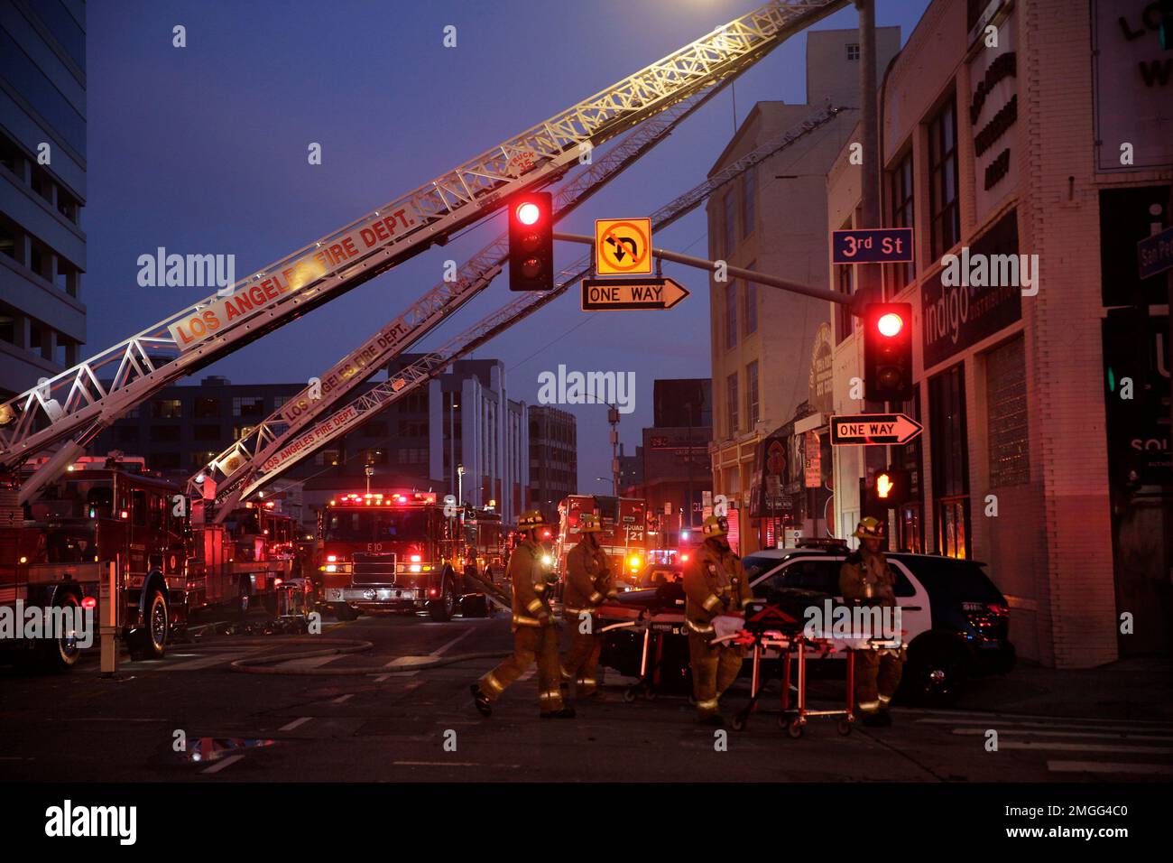 Los Angeles Fire Department firefighters work the scene of a structure ...