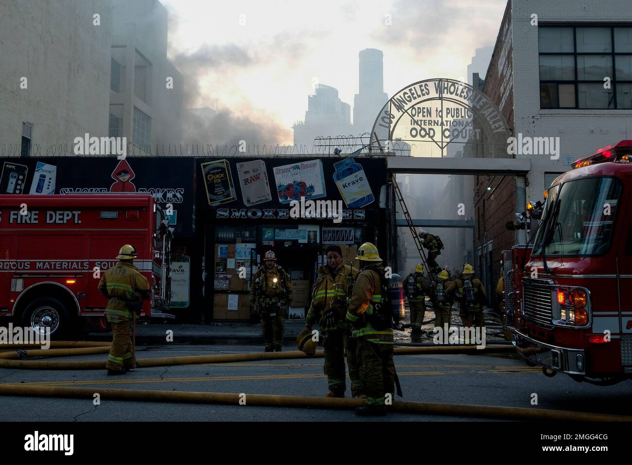 Los Angeles Fire Department firefighters work the scene of a structure ...