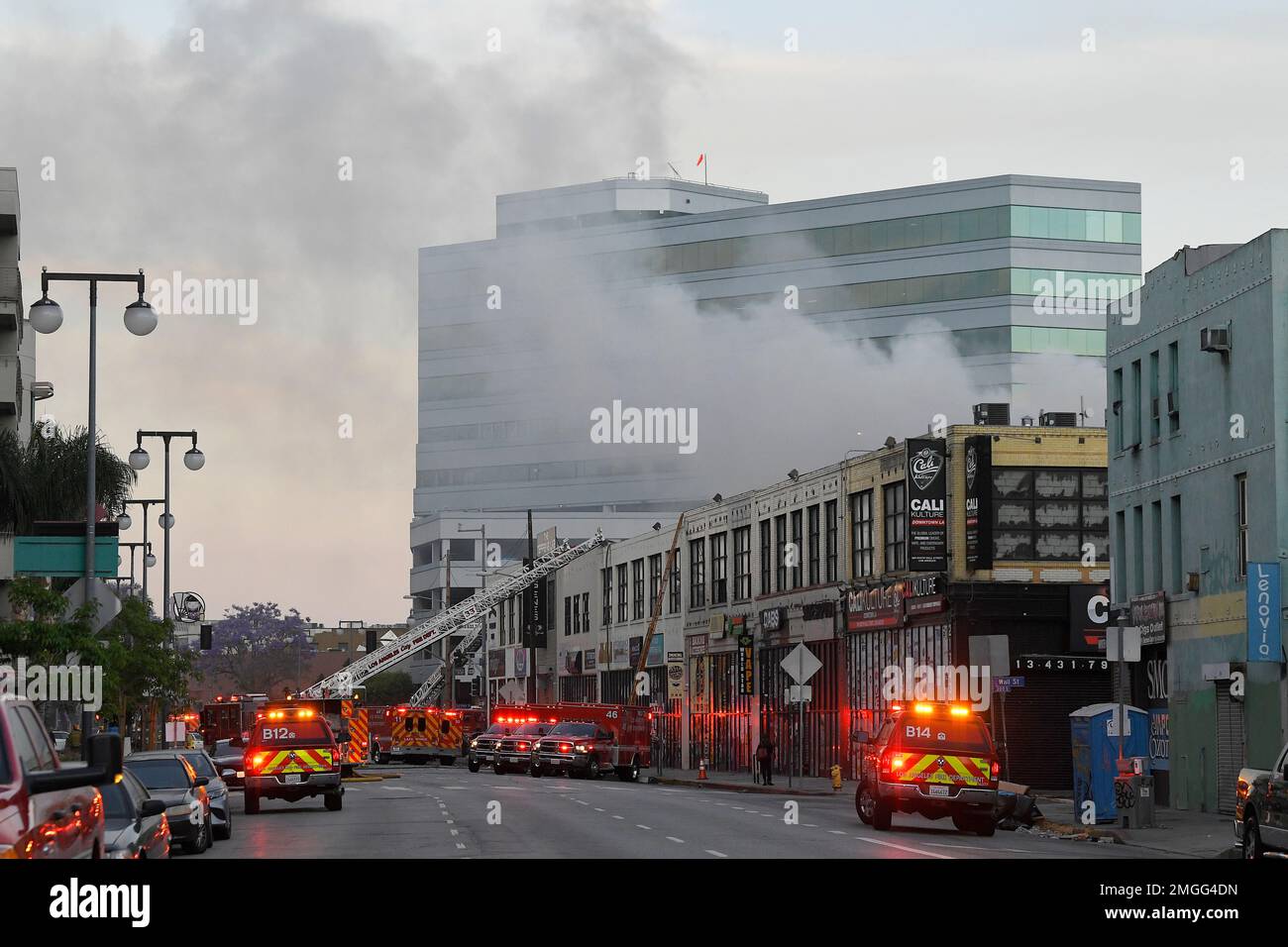 Los Angeles Fire Department firefighters work the scene of a structure ...