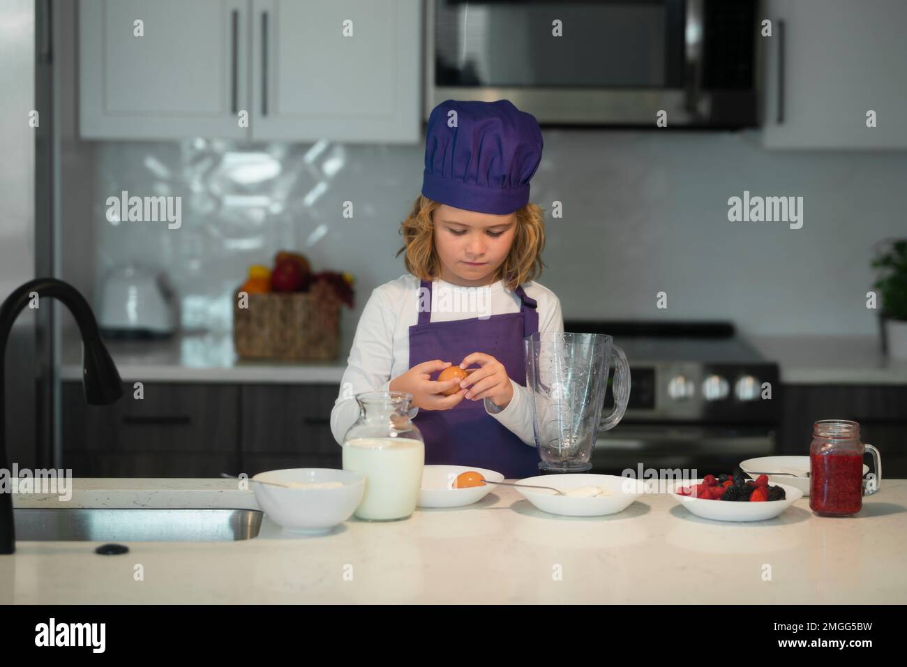 Chef child cooking. Funny little kid chef cook wearing uniform cook cap ...