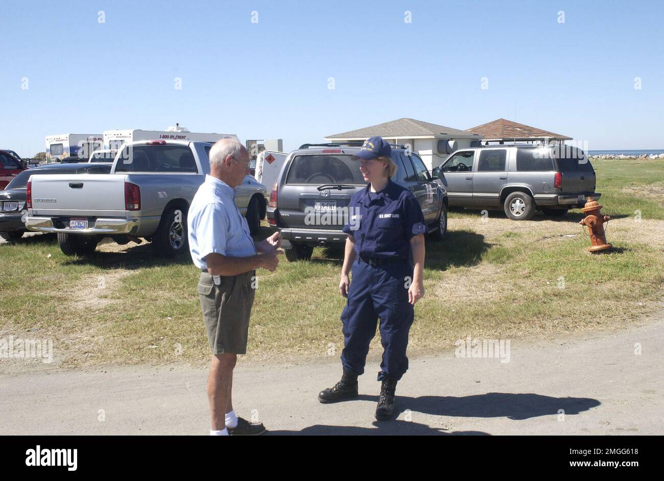 Coast Guard Auxiliary - 26-HK-64-15. Coast Guard woman and civilian ...