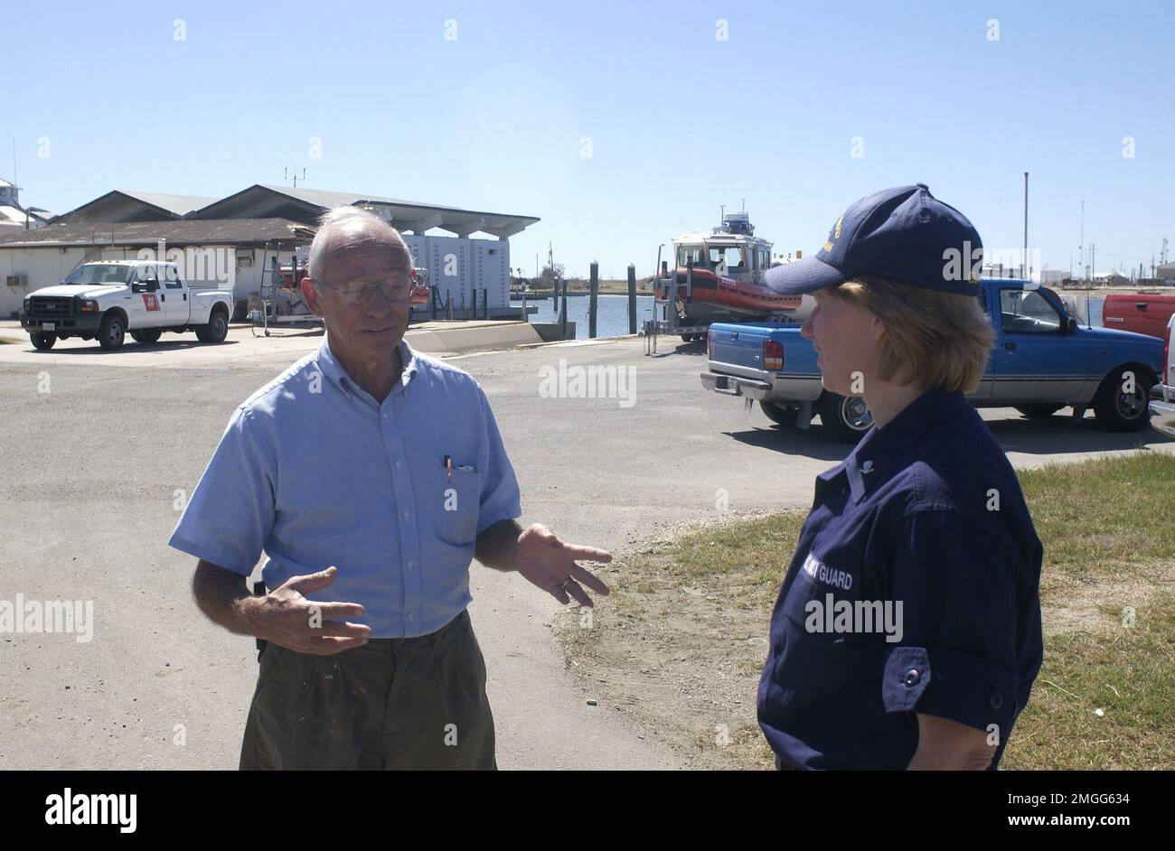 Coast Guard Auxiliary - 26-HK-64-12. Coast Guard woman and civilian ...