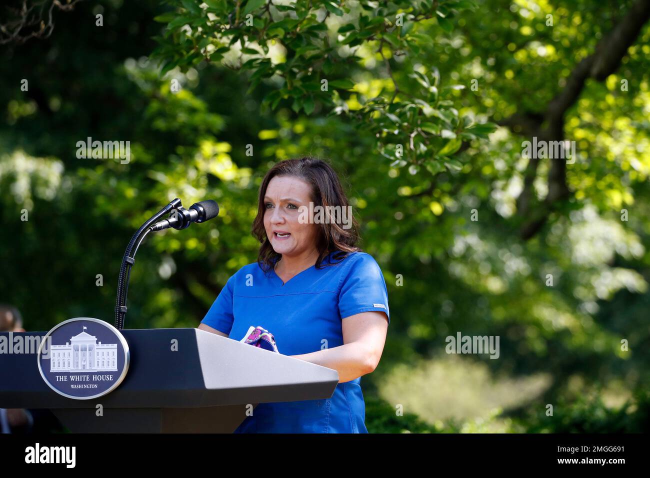 Nurse Amy Ford speaks during a presidential recognition ceremony in the ...