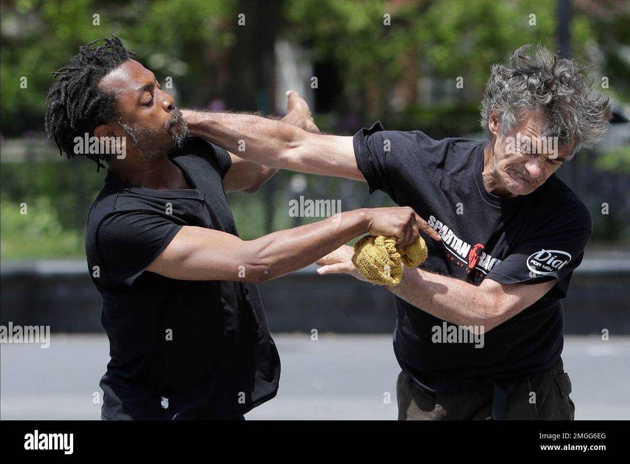 Two men exchange punches in Washington Square Park Friday, May 15, 2020 ...