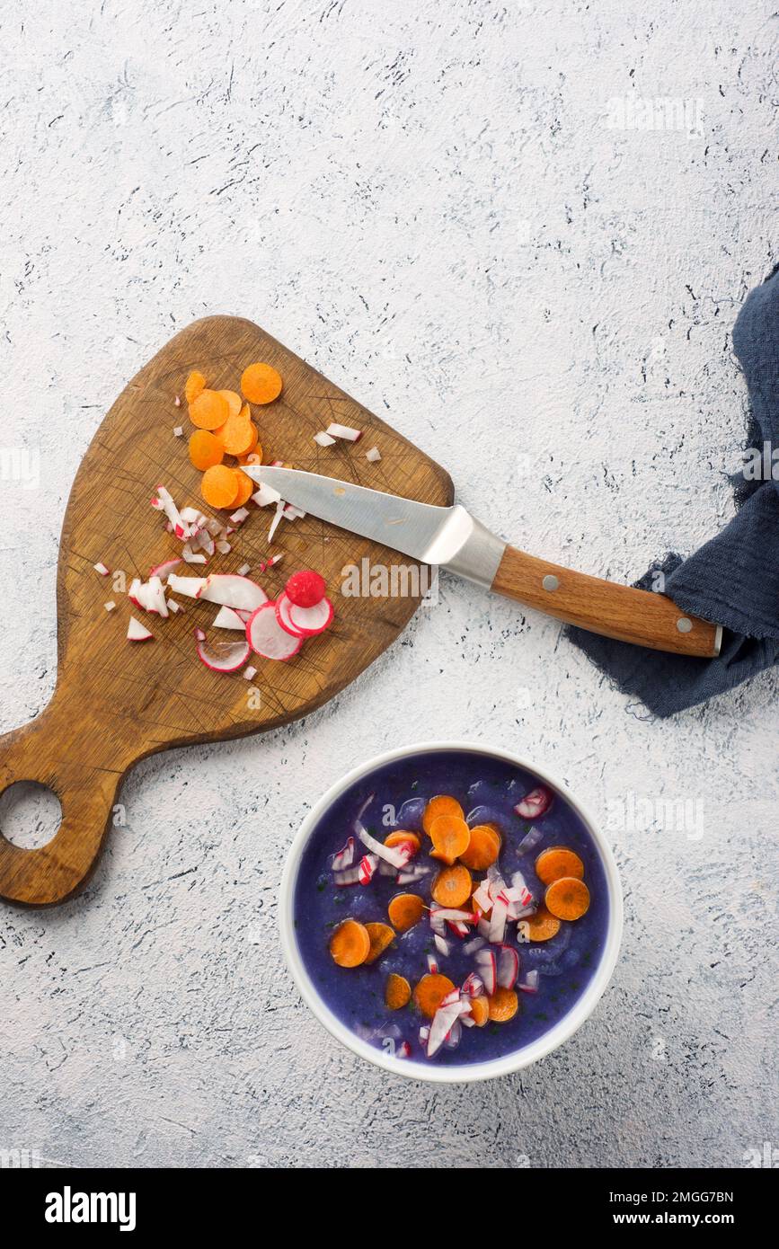 Red cabbage cream with radishes and carrots Stock Photo - Alamy