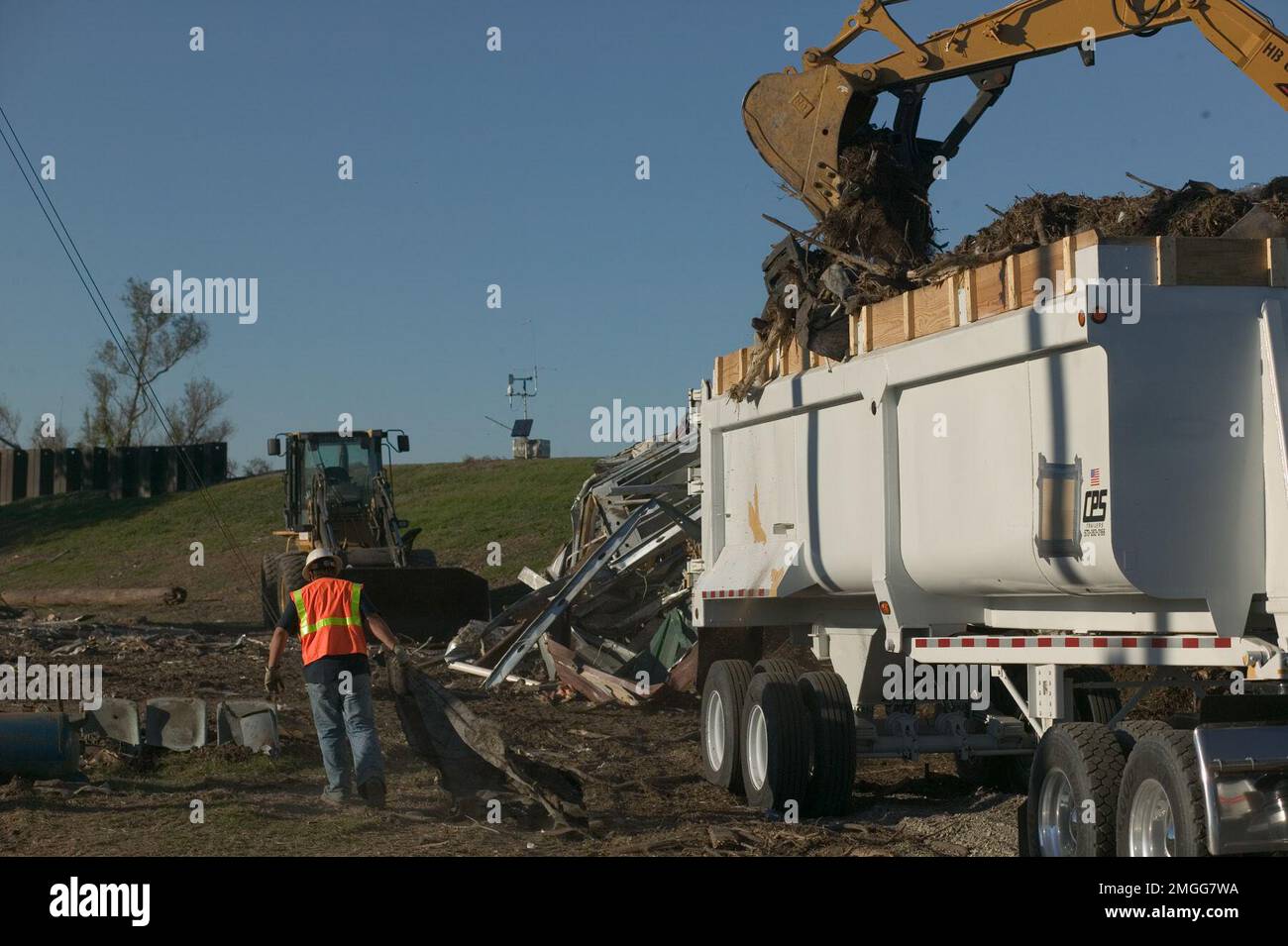 Aftermath - Debris - 26-HK-31-10. Plaquemines debris--crane filling ...