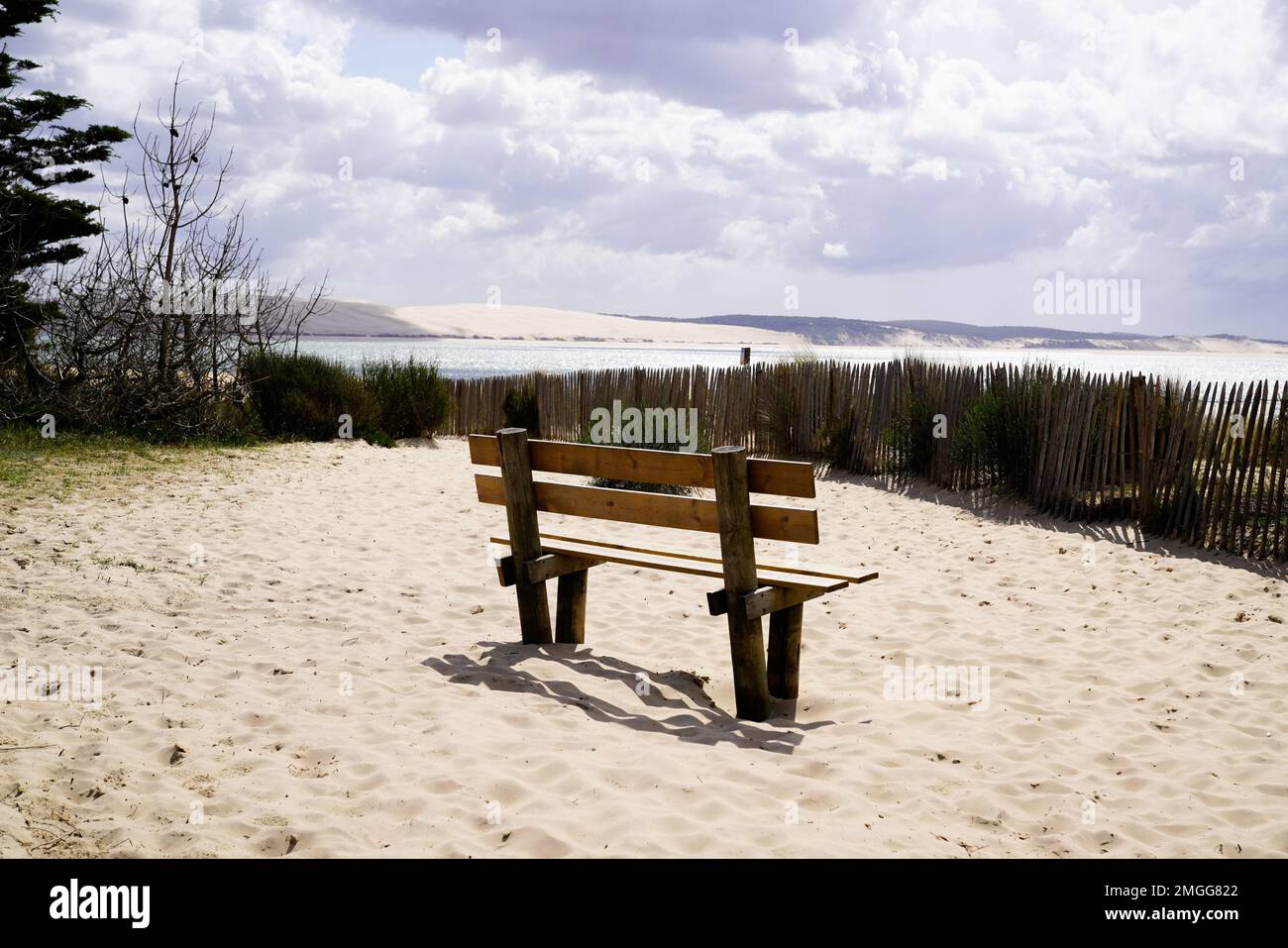 wooden relax bench seat on sea coast atlantic ocean in Cap Ferret ...