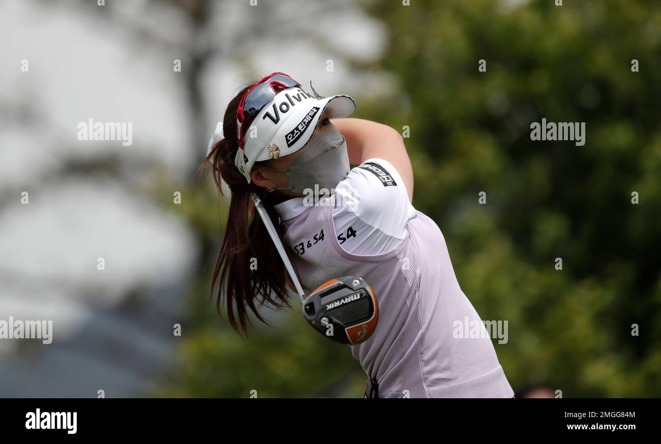 Cho A-yean of South Korea wearing a face mask watches her tee shot on ...