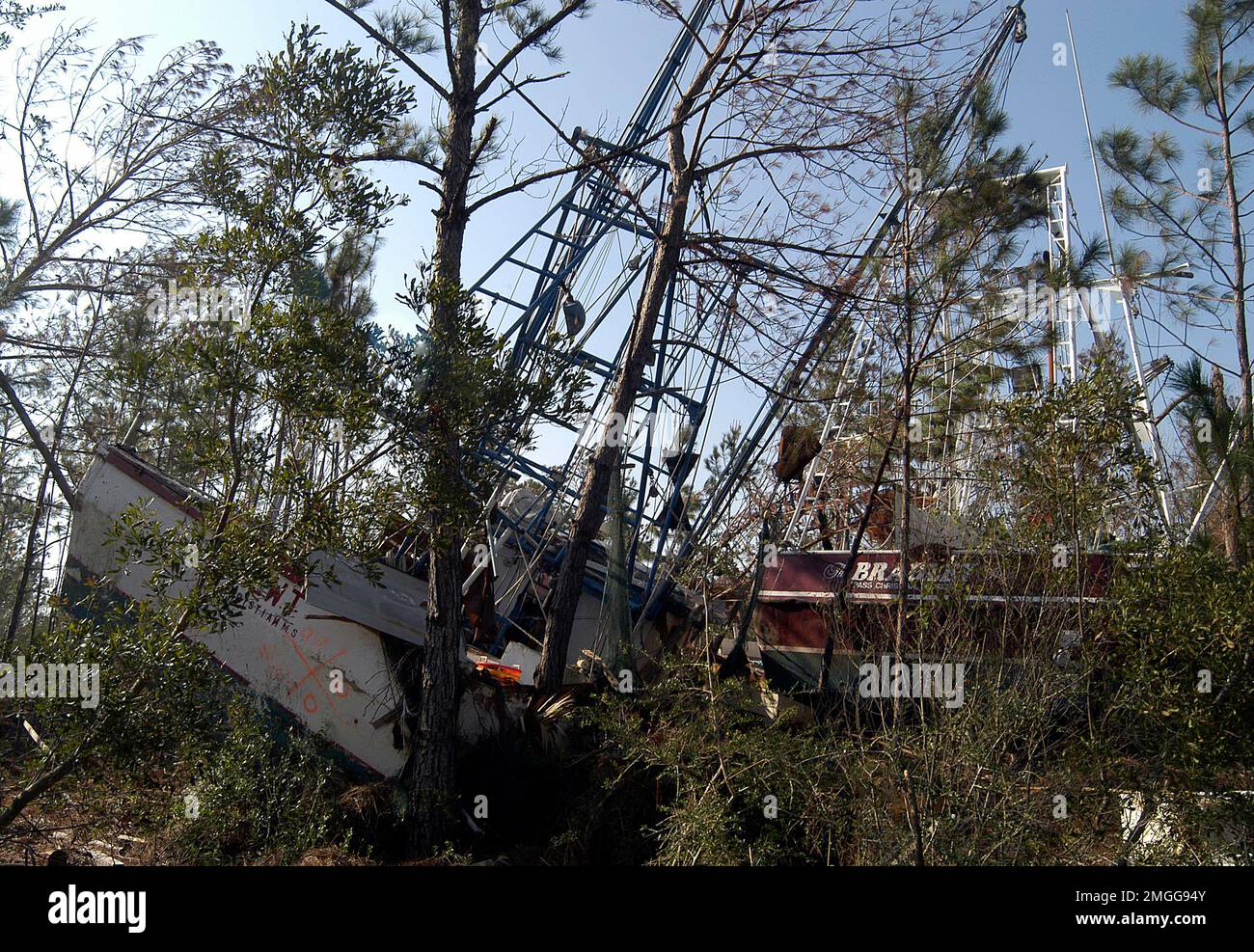 Bayou Portage - 26-HK-67-7. Bayou Portage--two displaced boats among ...