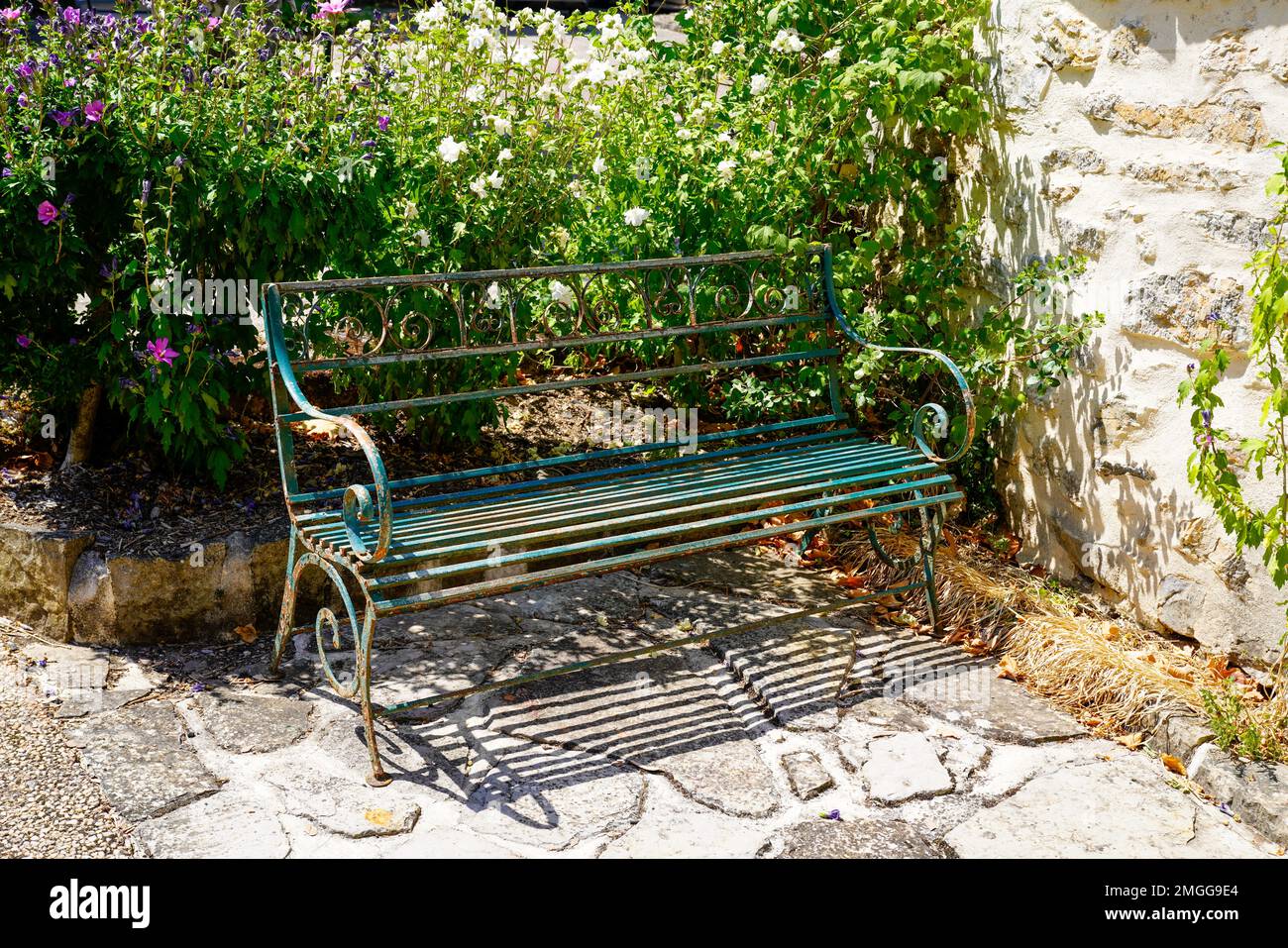 wooden steel bench green iron and wood in summer street in ancient ...