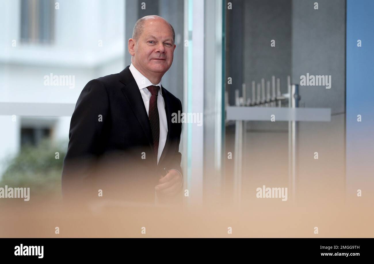 German Finance Minister Olaf Scholz arrives for a press conference in ...
