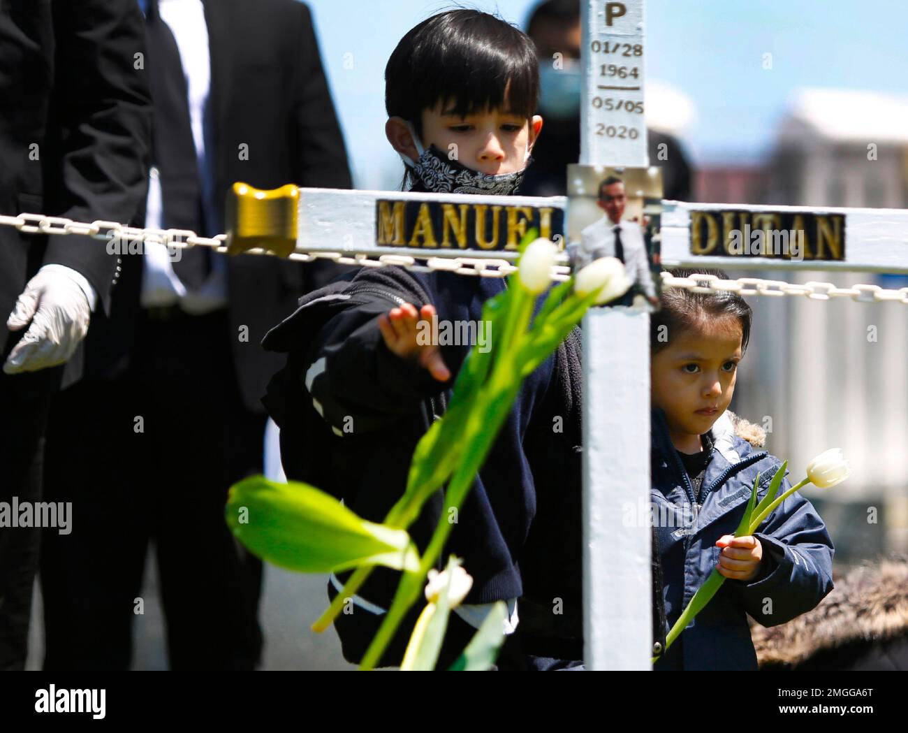 In this May 12, 2020 photo, Adriano Cuzco, a relative of Manuel Dutan ...