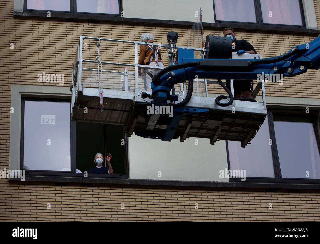In this photo taken on Saturday, May 9, 2020, Bernadette Focant, left ...