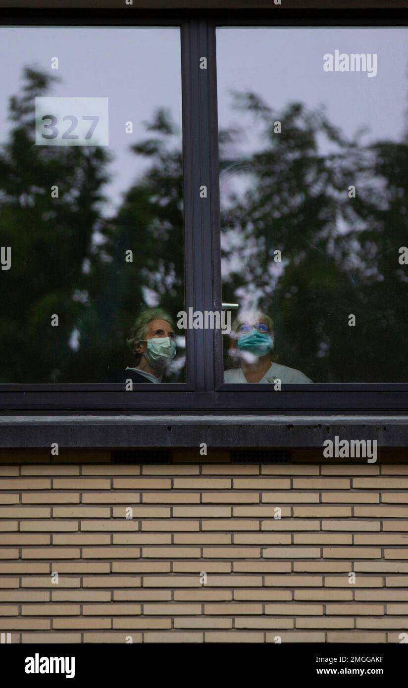 In this photo taken on Saturday, May 9, 2020, Bernadette Focant, left ...