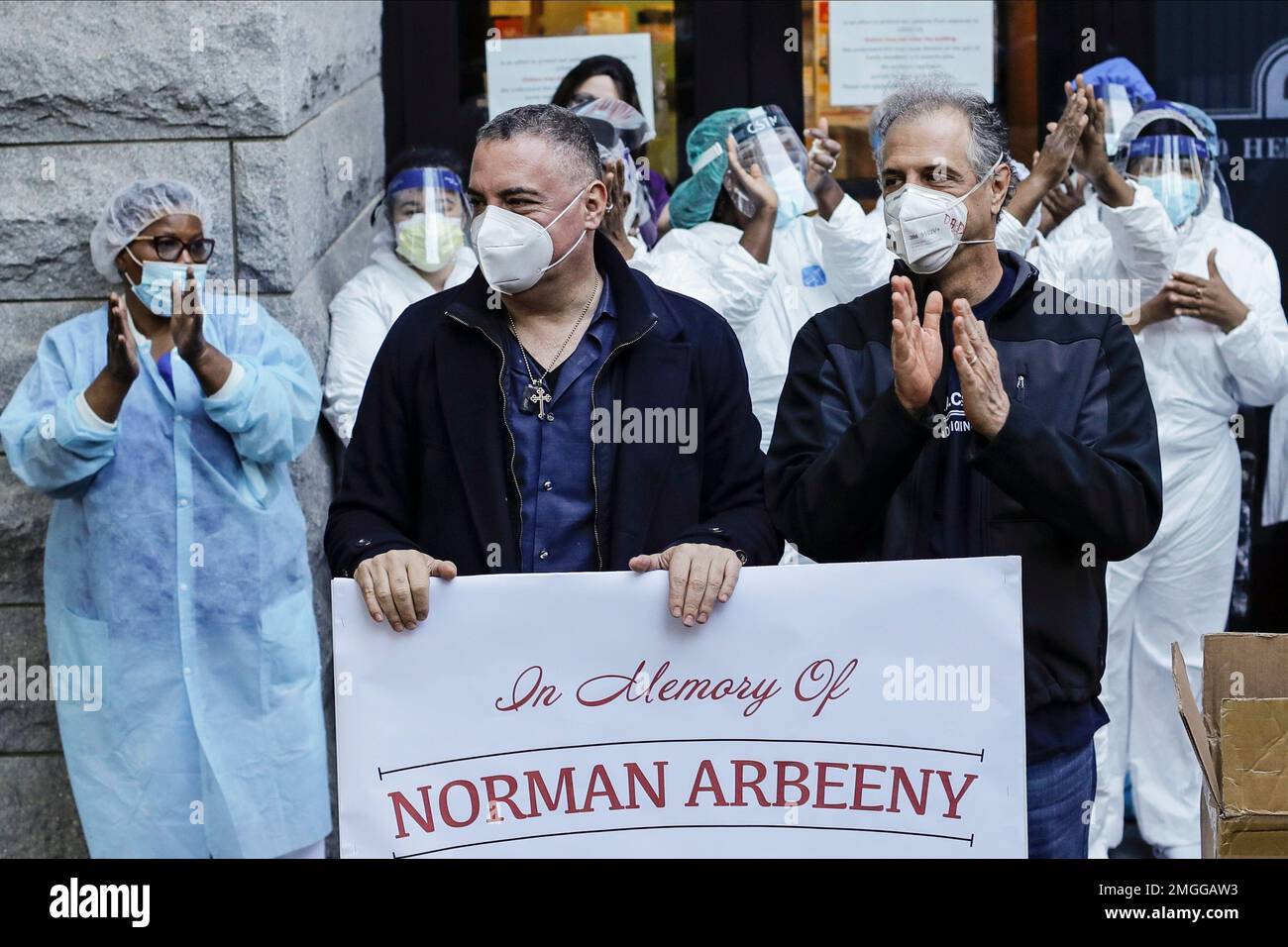 Daniel Arbeeny, left, and his brother Peter Arbeeny react with medical ...