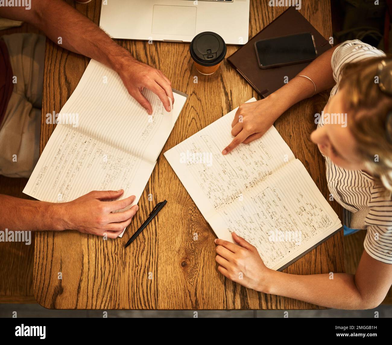 Preparing for finals is a team effort. High angle shot of two ...