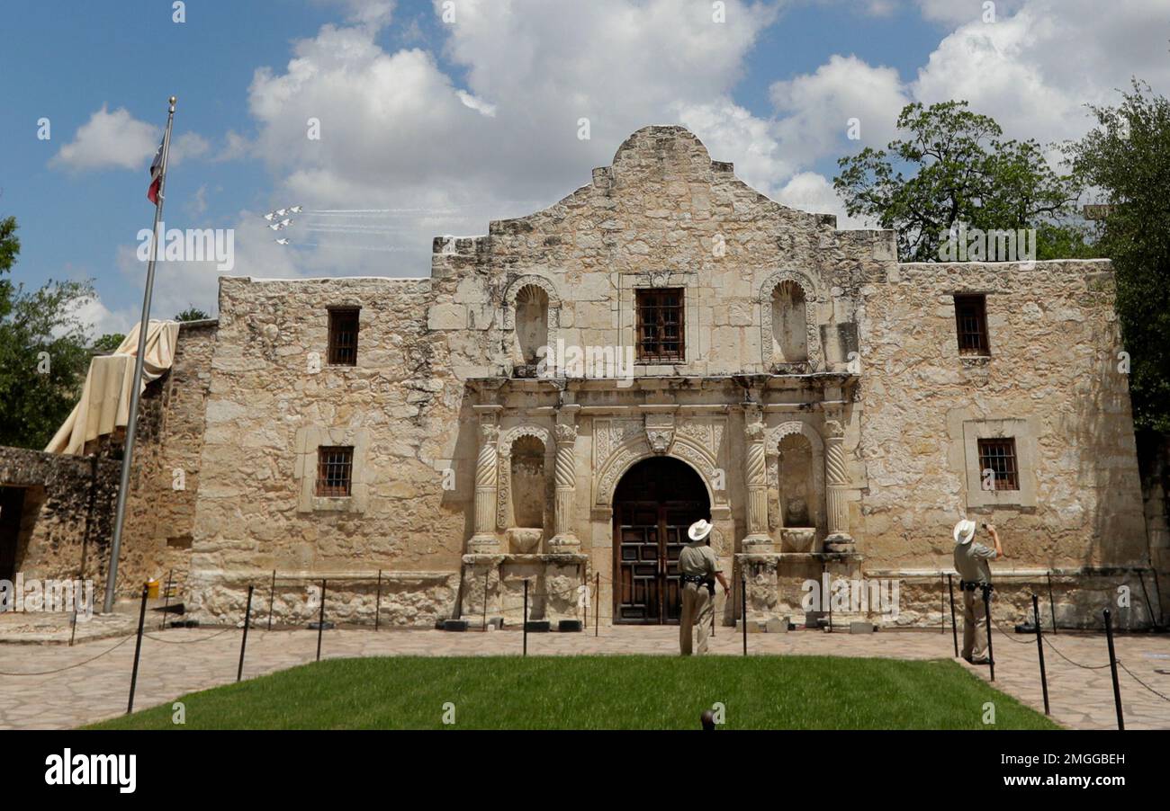 The U.S. Air Force Thunderbirds pass behind the Alamo as they make a ...