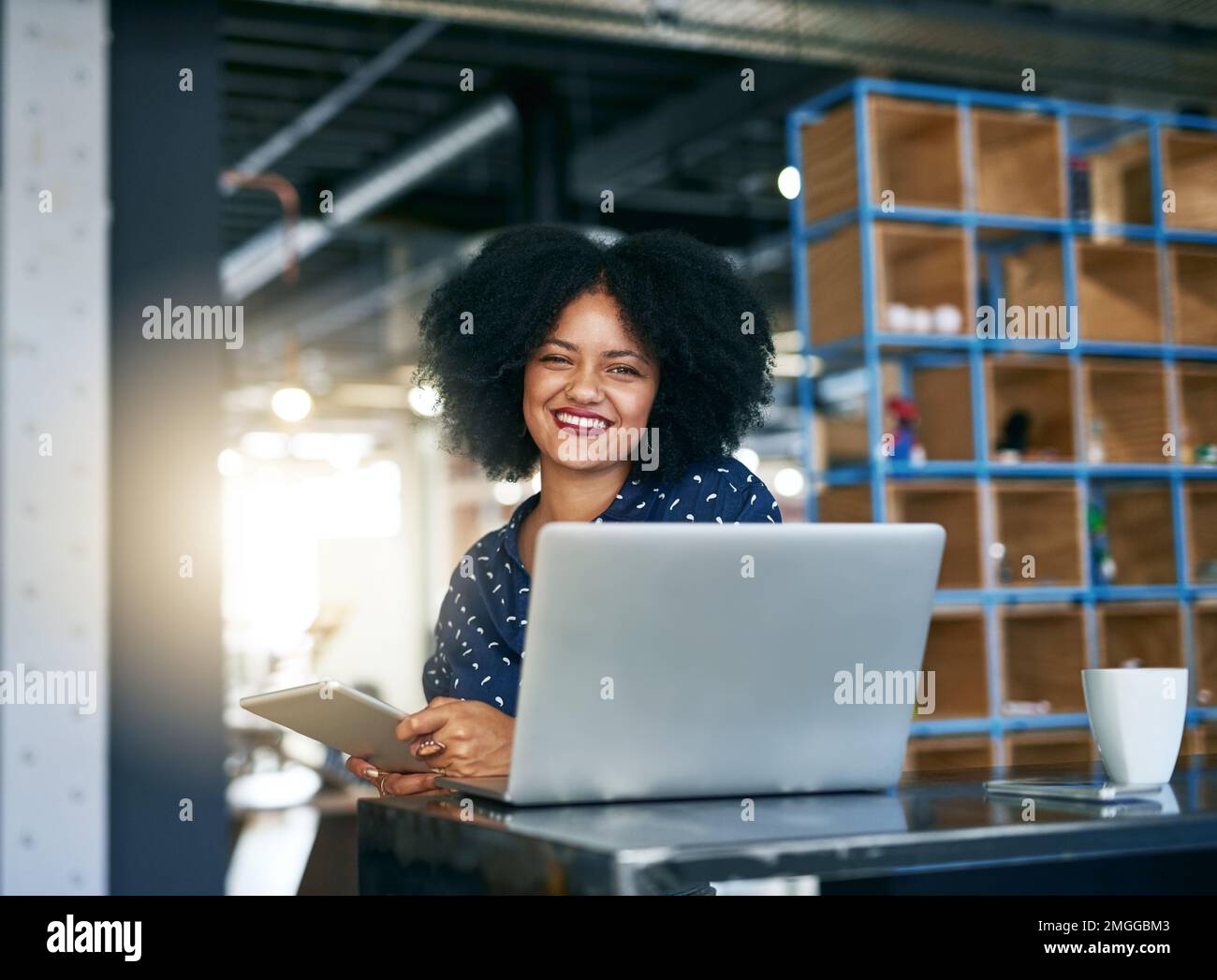 She uses technology to her advantage. a young female designer working ...
