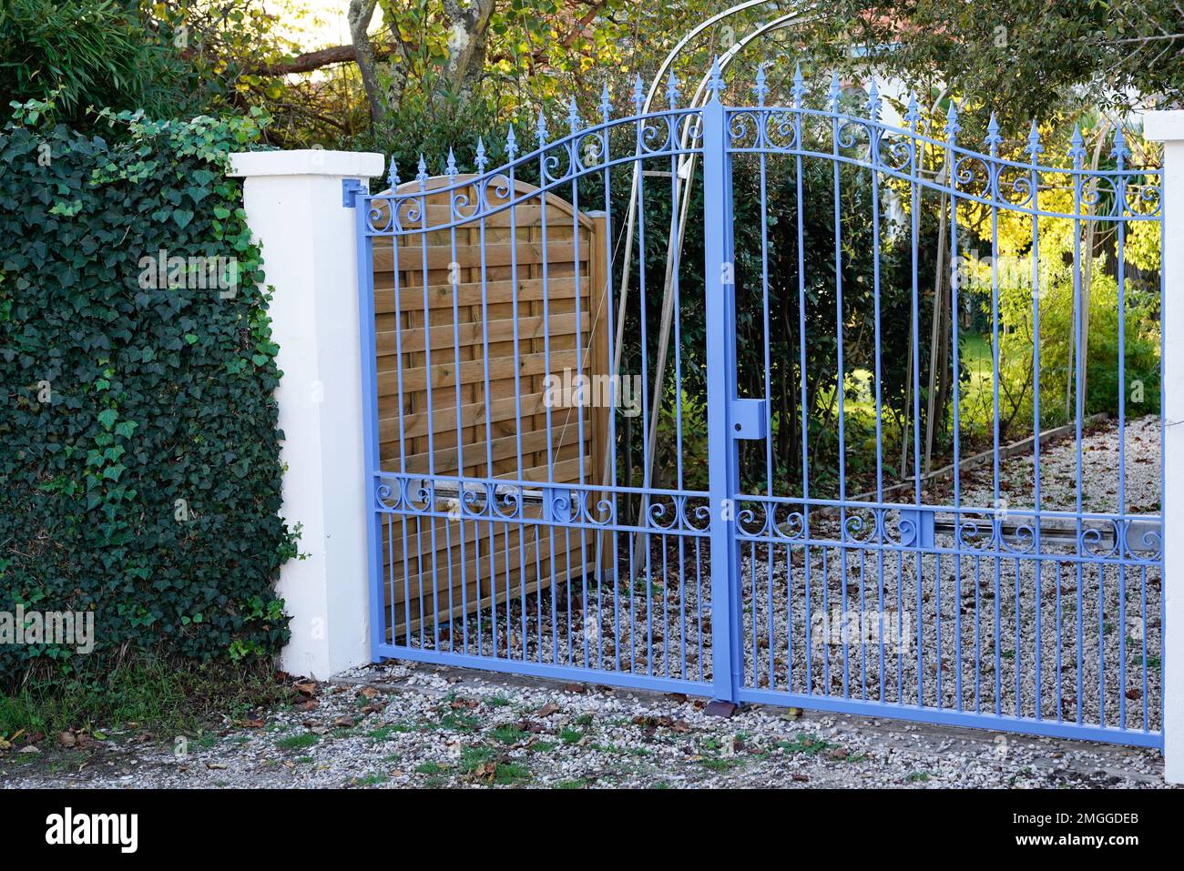 old blue classical metal home gate at entrance of house portal garden ...