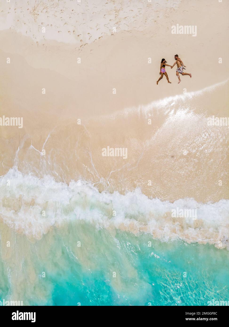 Woman beach top view laying hi-res stock photography and images - Alamy