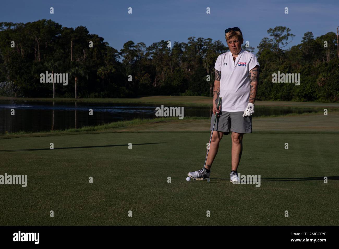 U.S. Army Staff Sgt. Stacey Englert studies the green while competing ...