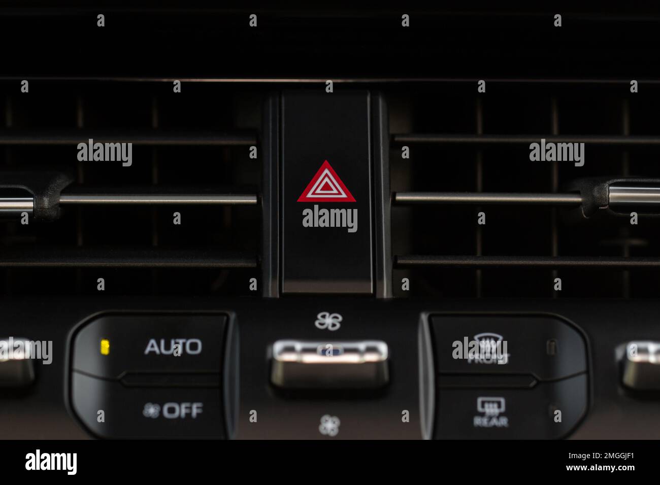 Emergency button in car, hazard light. Close up of car emergency button ...