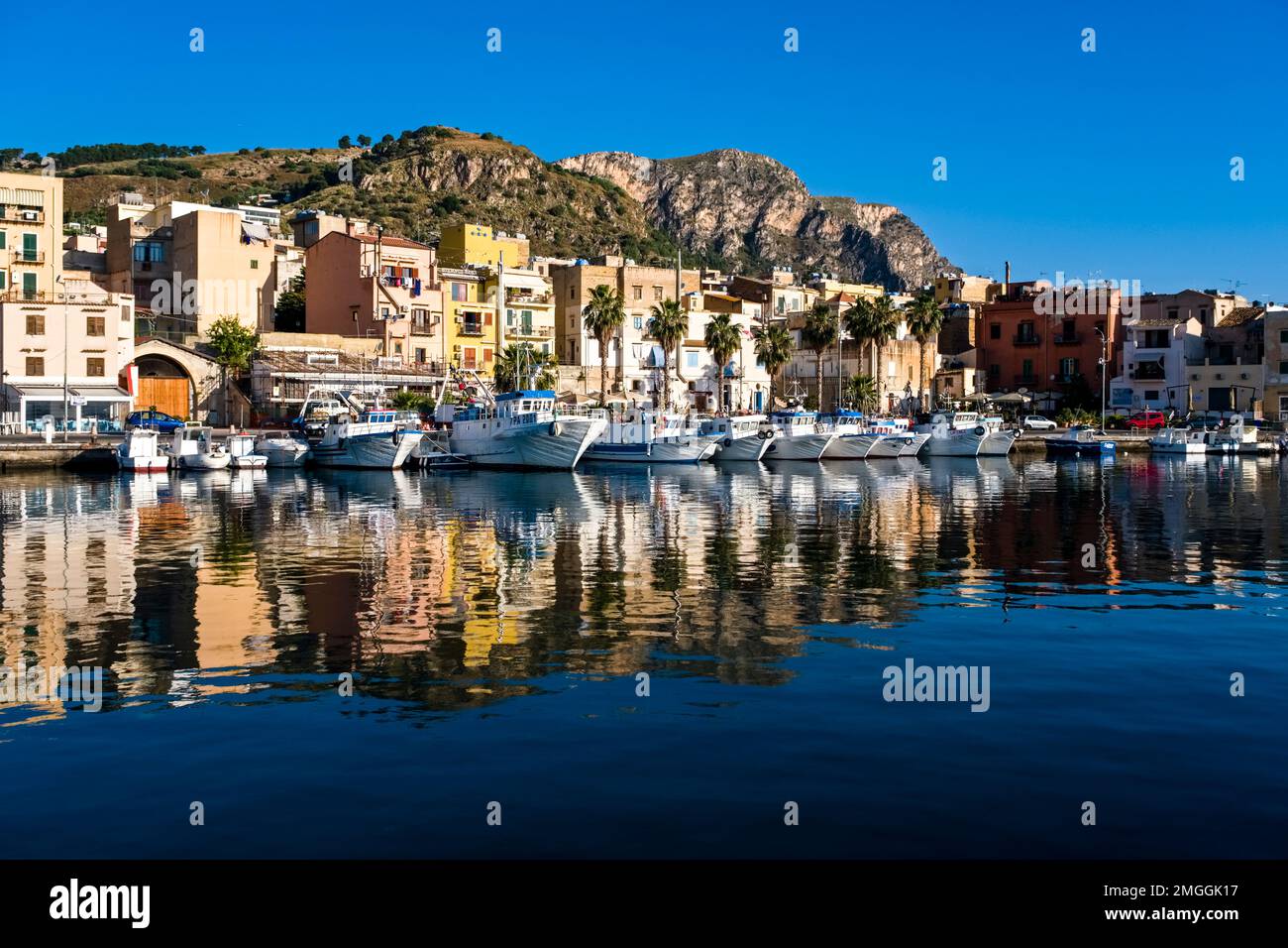 View across the water to the port and marina of the small town of ...