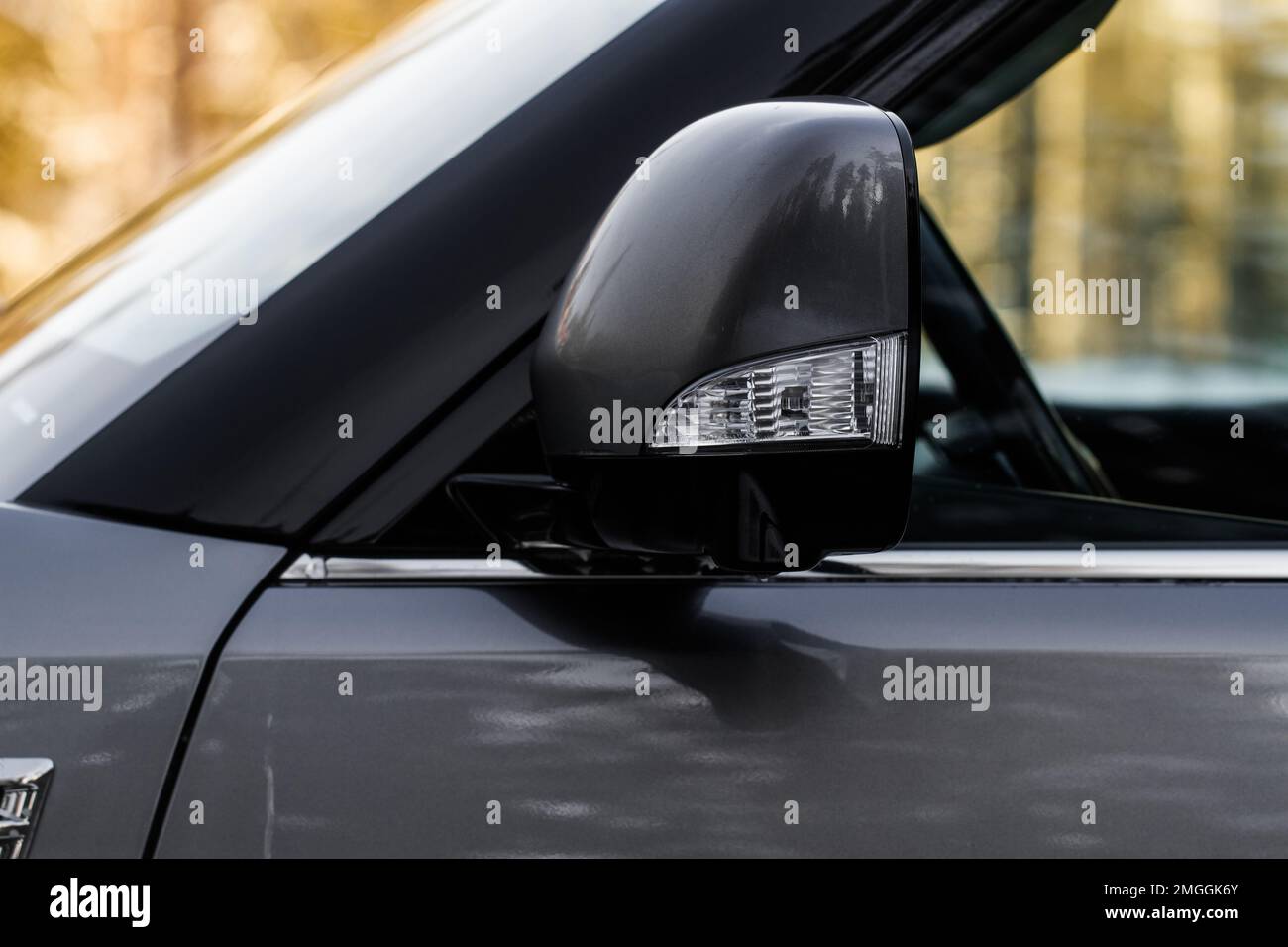 Modern car turn signal side repeater lamp. Car with turn signal ...