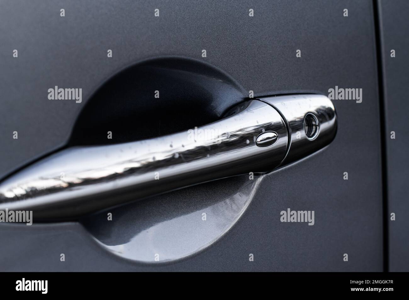 Close up of car door handle. Keyless entry system with touch sensor ...
