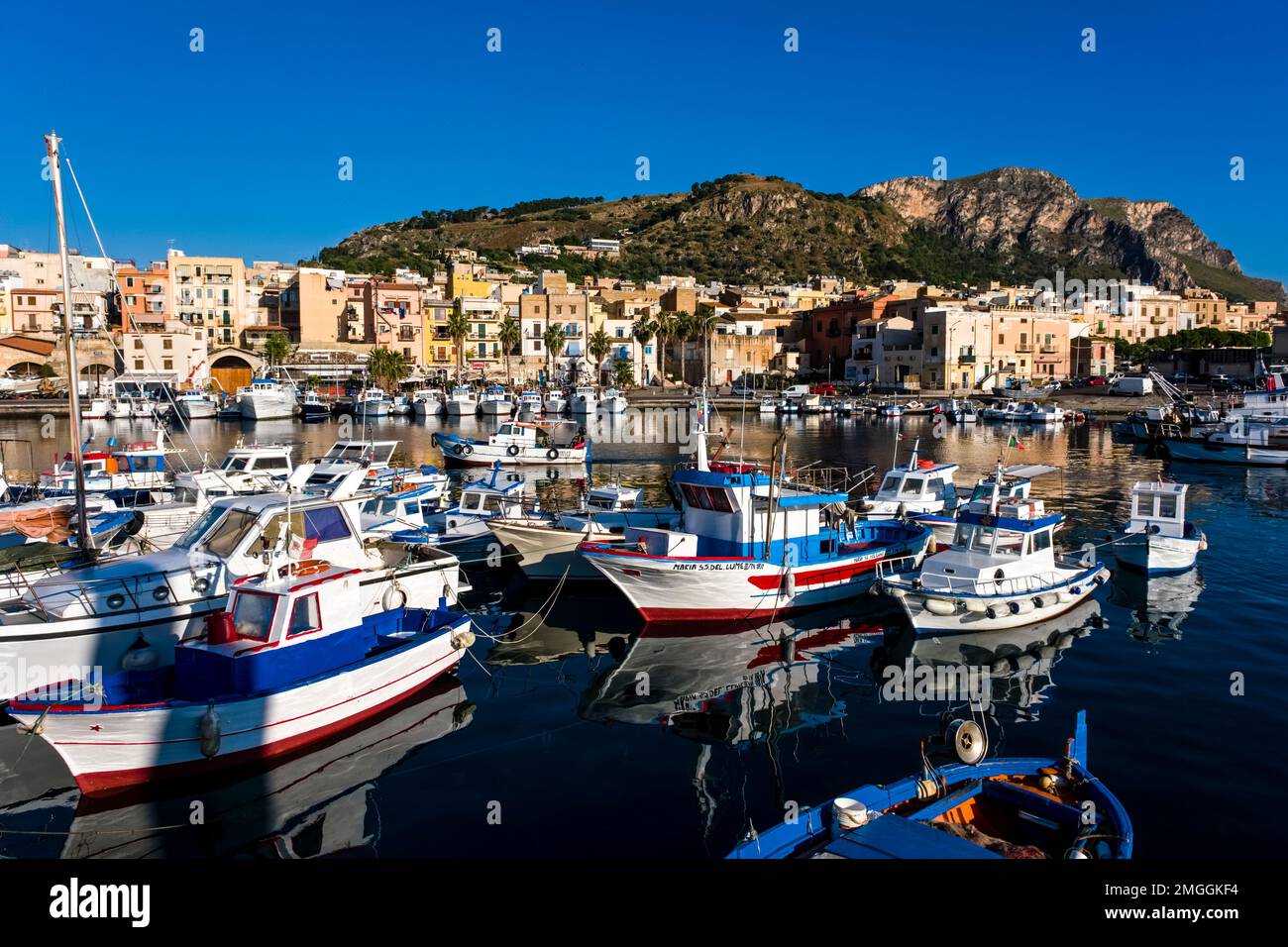 View across the water to the port and marina of the small town of ...