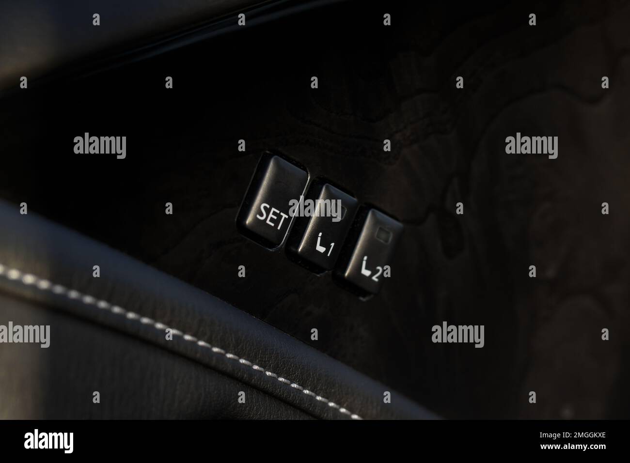 Memory car seat position buttons. Adjusting seat Stock Photo - Alamy