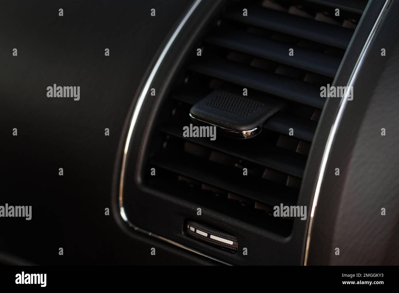 Car air conditioning close up view. The air conditioner flow inside the ...