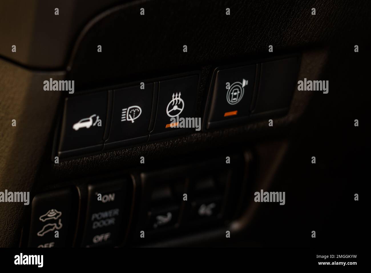 Close up of car steering wheel heating control. Steering wheel heating ...