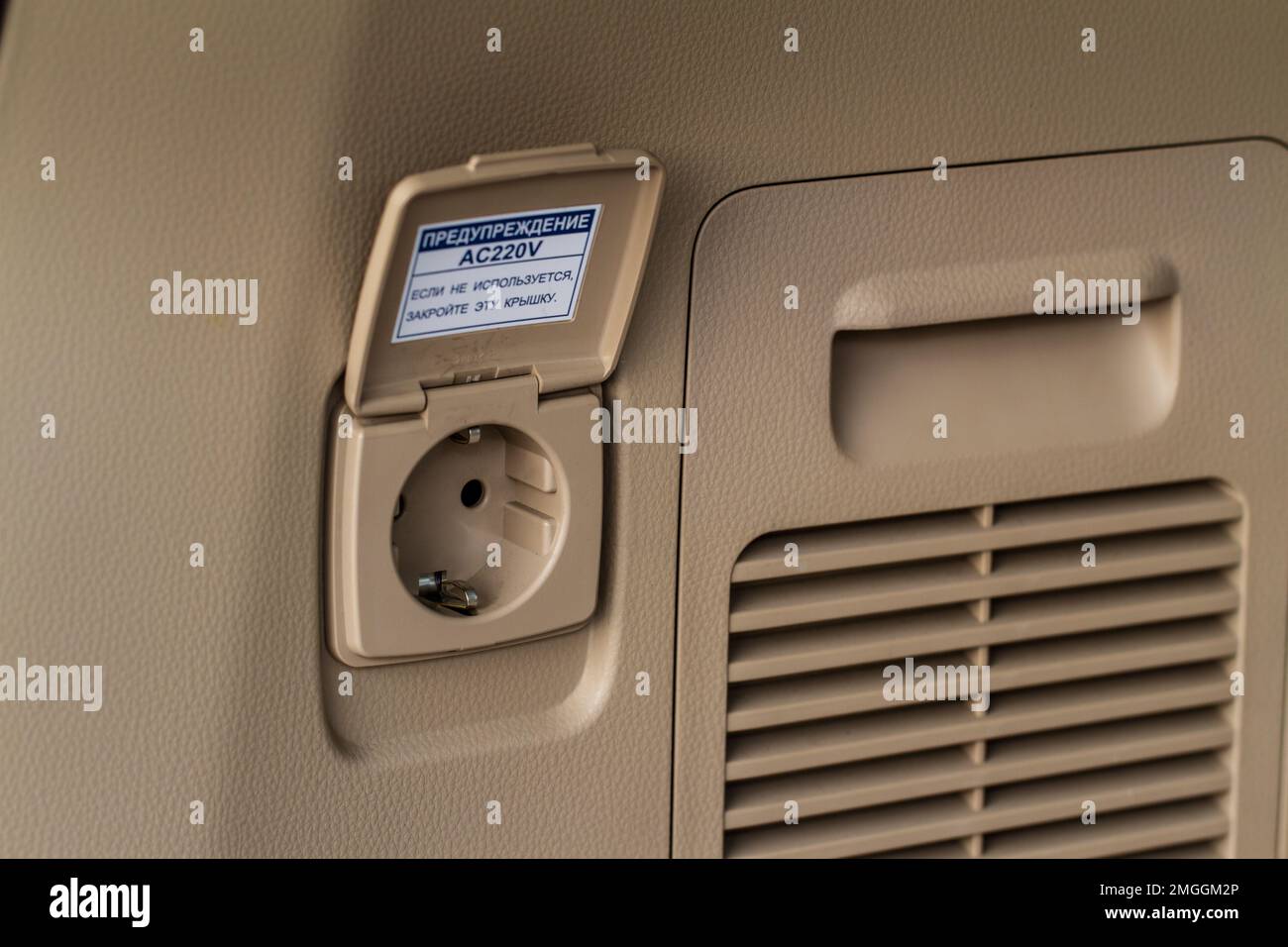 220v power outlet socket in the car. Opened sockets Stock Photo - Alamy