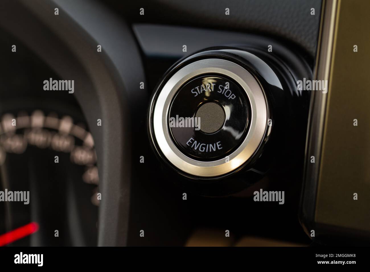 Engine start button with fingerpint close up. Car engine start button ...