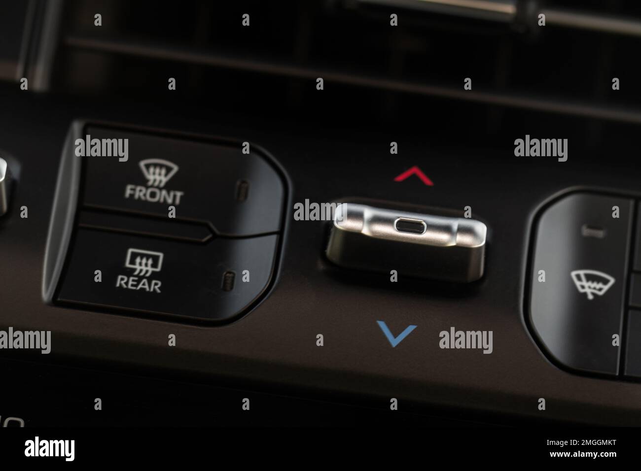 Buttons for warmer air and cooler air. Buttons to control air ...